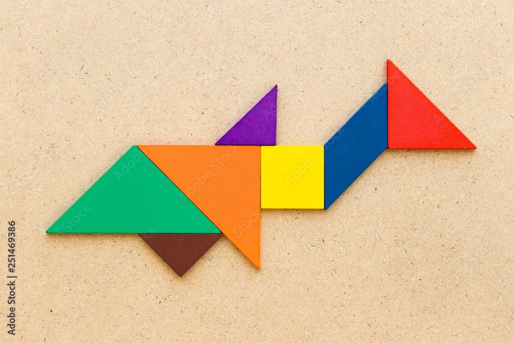 Color tangram puzzle in shark or whale shape on wood background Stock ...