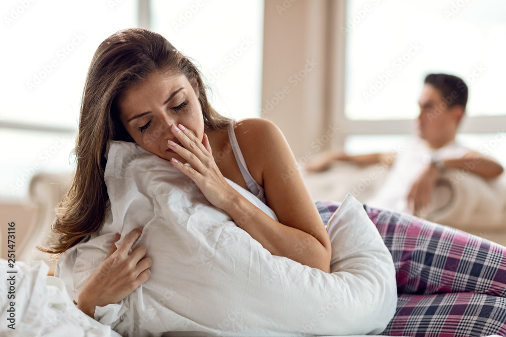 Sad woman crying and feeling inconsolable after breaking up with her ...