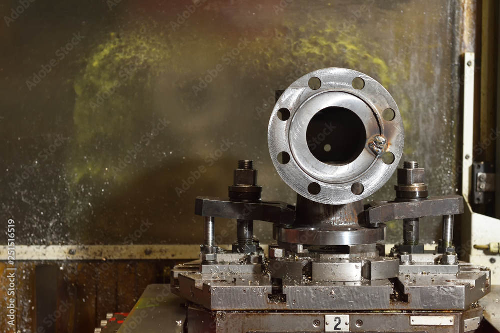 The body for creating the valve is installed on the table of the CNC ...