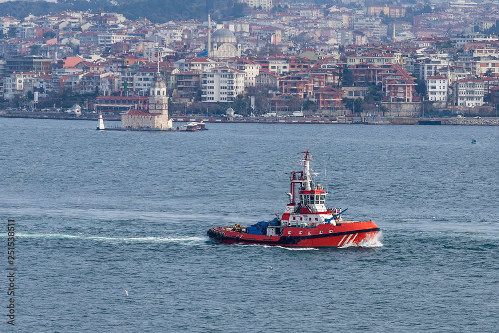 Red fire tug boat equipped with saftey equipment Stock Photo | Adobe Stock