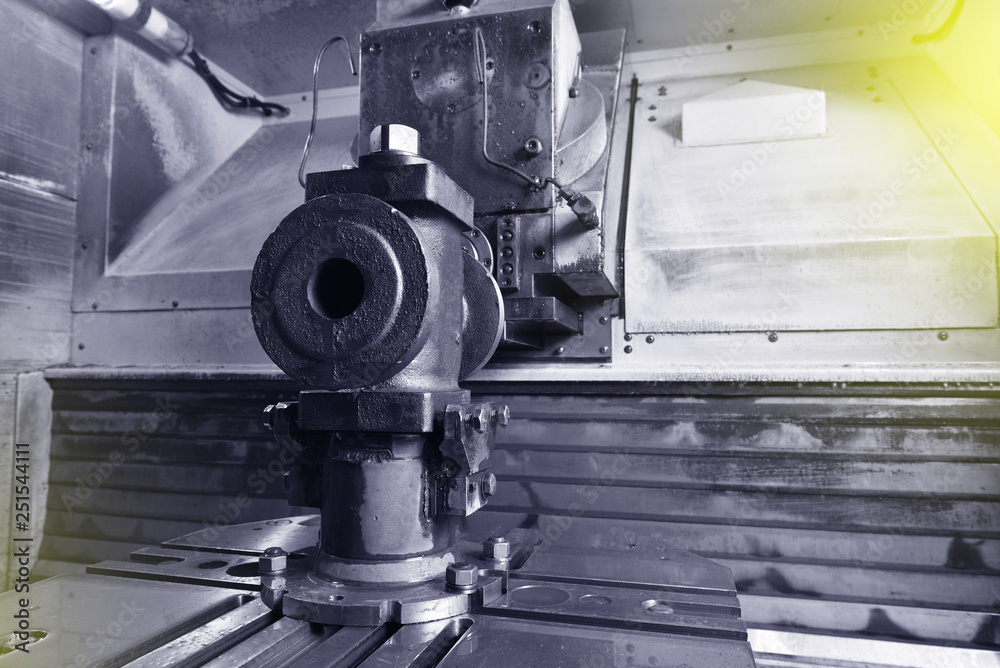 The body for creating the valve is installed on the table of the CNC ...