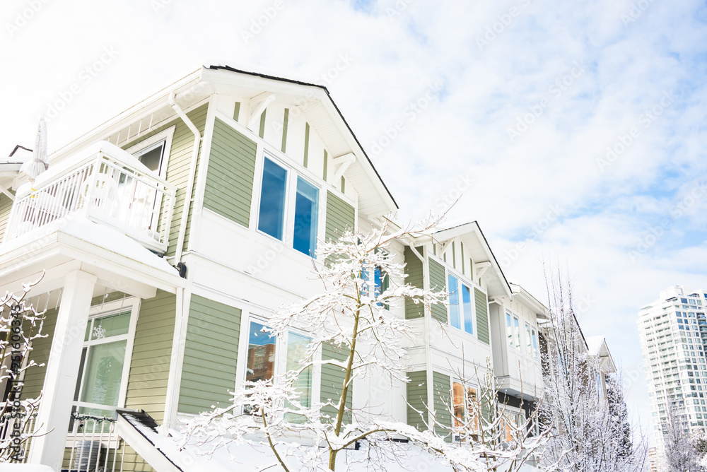 Top of residential townhouses and high-rise apartment building on ...