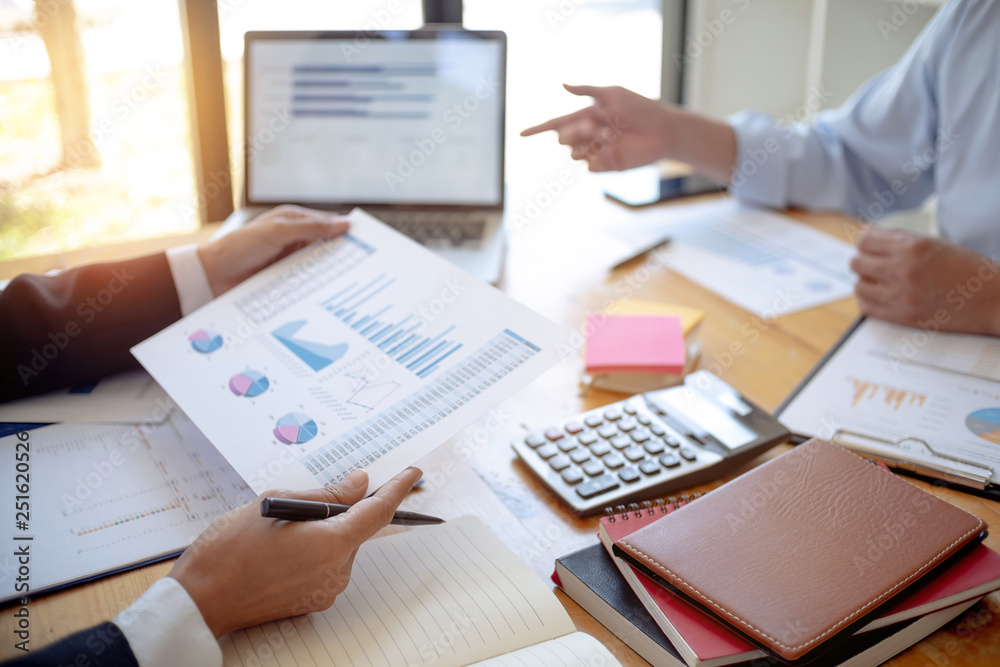 Business financial team meeting about investment on stock exchange with ...