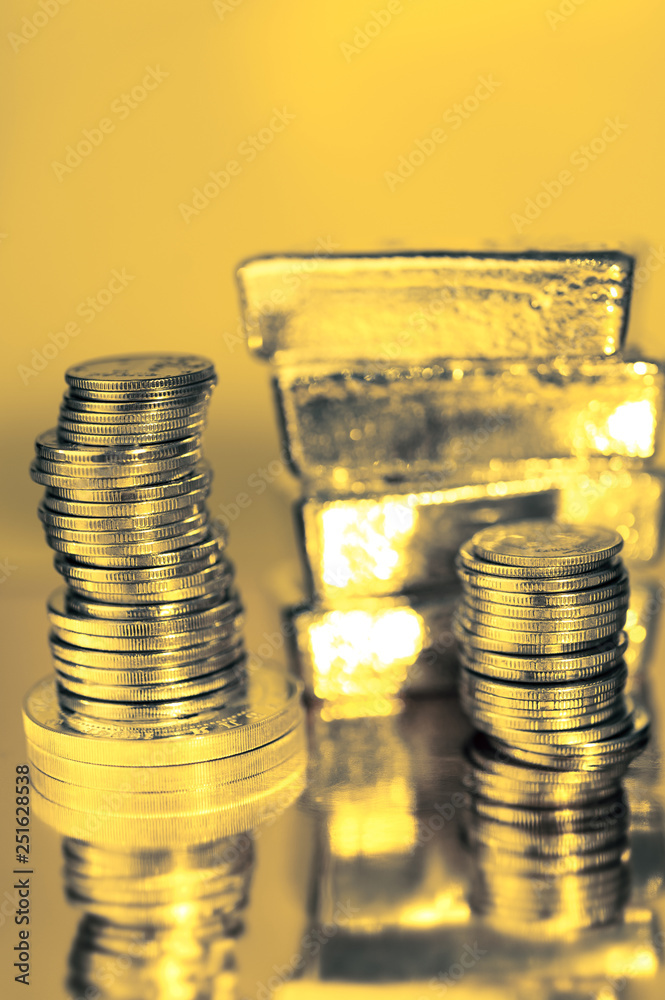 Gold bars and stack of gold coins. Background for finance banking ...