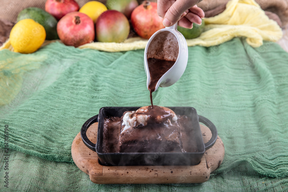 sizzling chocolate brownie is a sweet dish made using scoop of ice ...