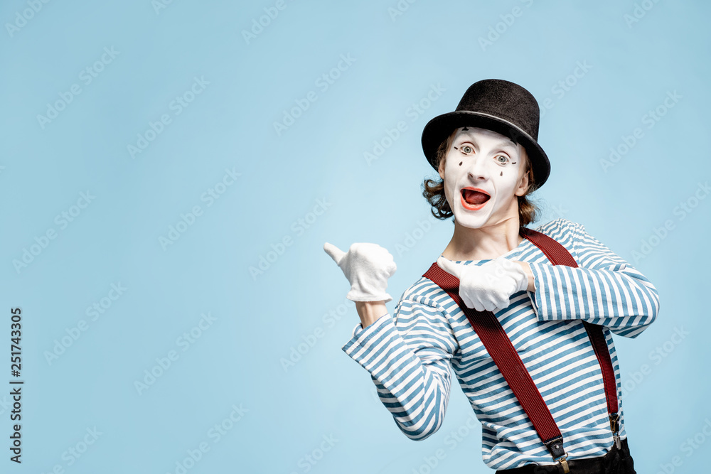 Emotional pantomime with white facial makeup showing empty space on the ...