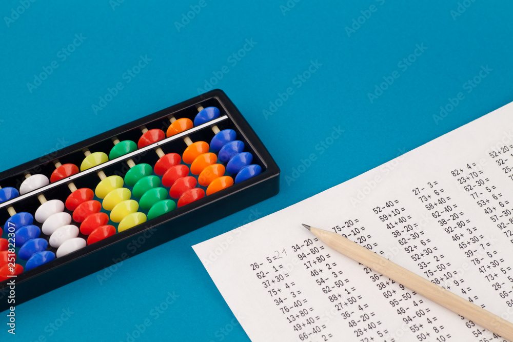 Abacus for mental arithmetic, on a blue background, with examples to ...