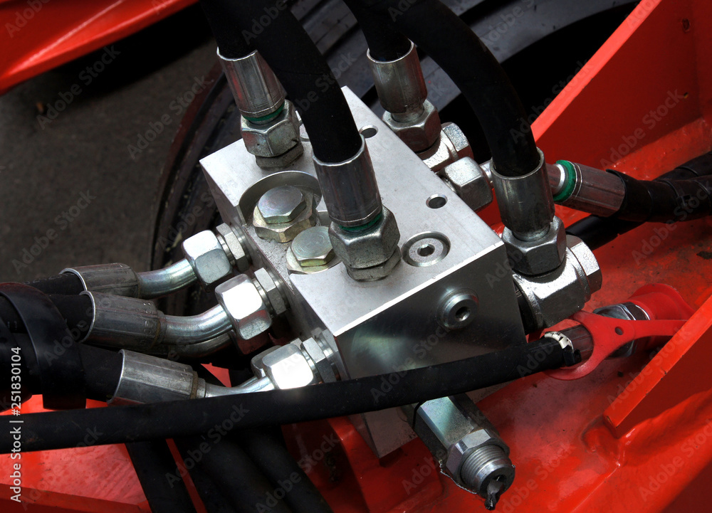 Hydraulic components of machinery Stock Photo | Adobe Stock