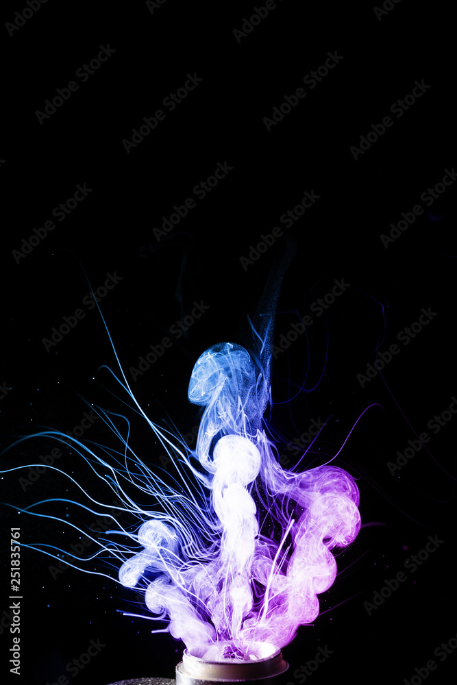 Colorful clouds of vape fog. Splash of colour and glicerine clouds with ...