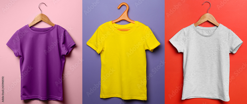 Different child t-shirts on color background Stock Photo | Adobe Stock