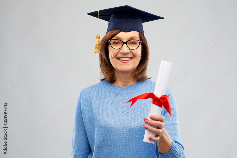 graduation, education and old people concept - happy senior graduate ...