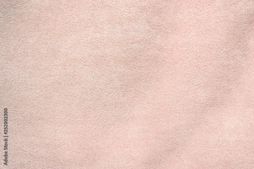 Suede is artificial. Light pink suede fabric close-up. Velvet texture ...