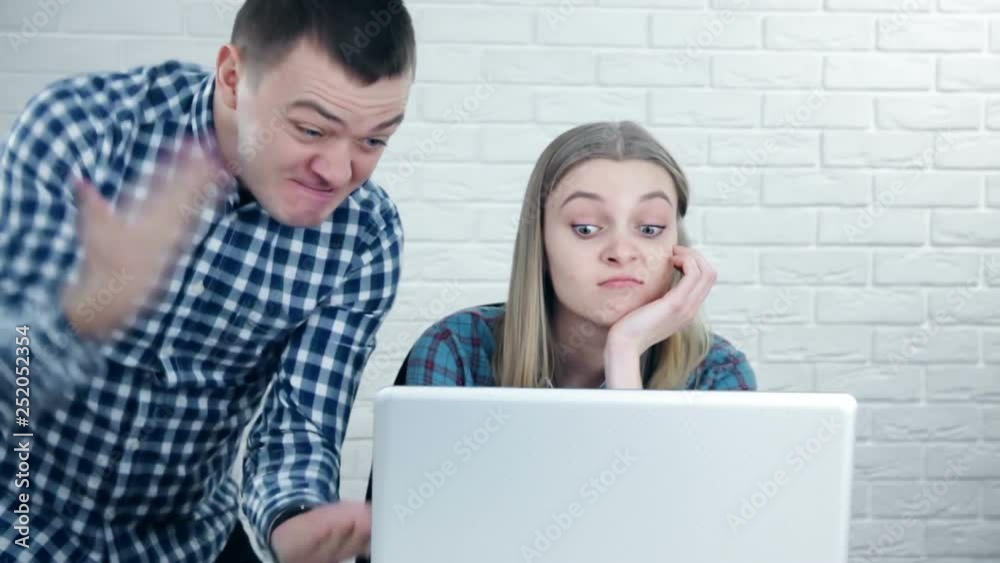 Angry boss yelling at his young employee, she is stressed and feeling ...