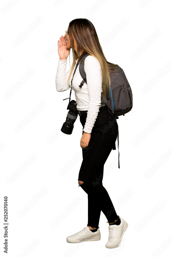 Full body of Young photographer woman shouting with mouth wide open to ...