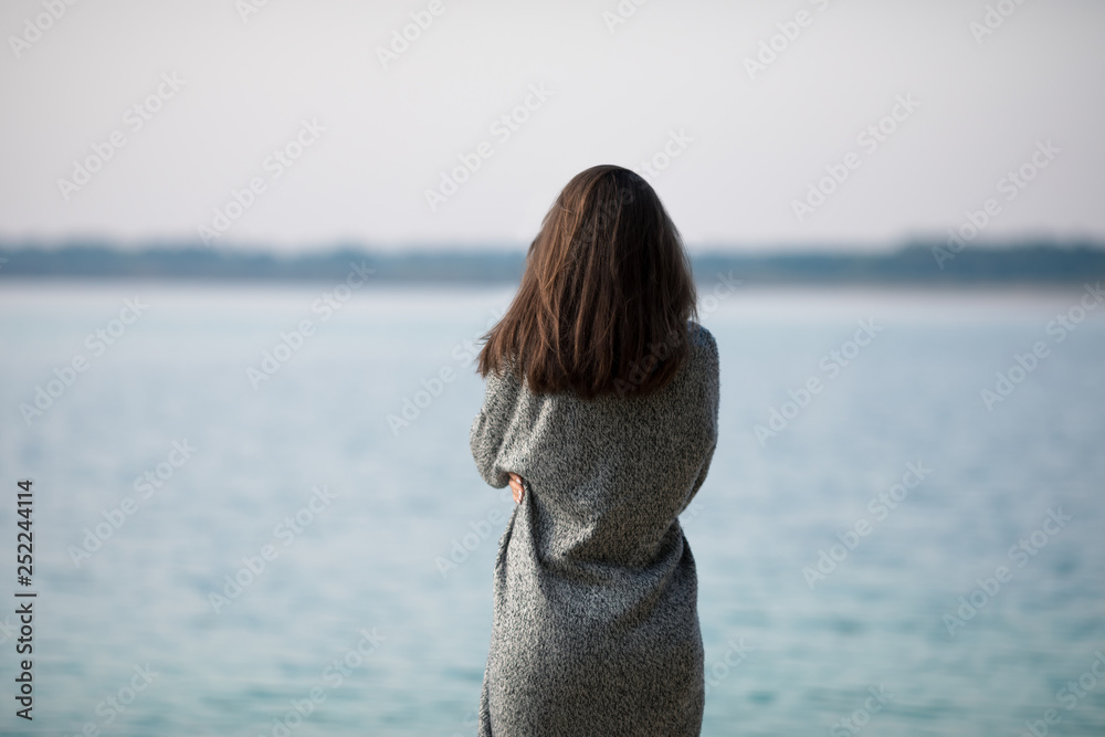 Art portrait of a young girl back view with flying hair. Stock Photo ...