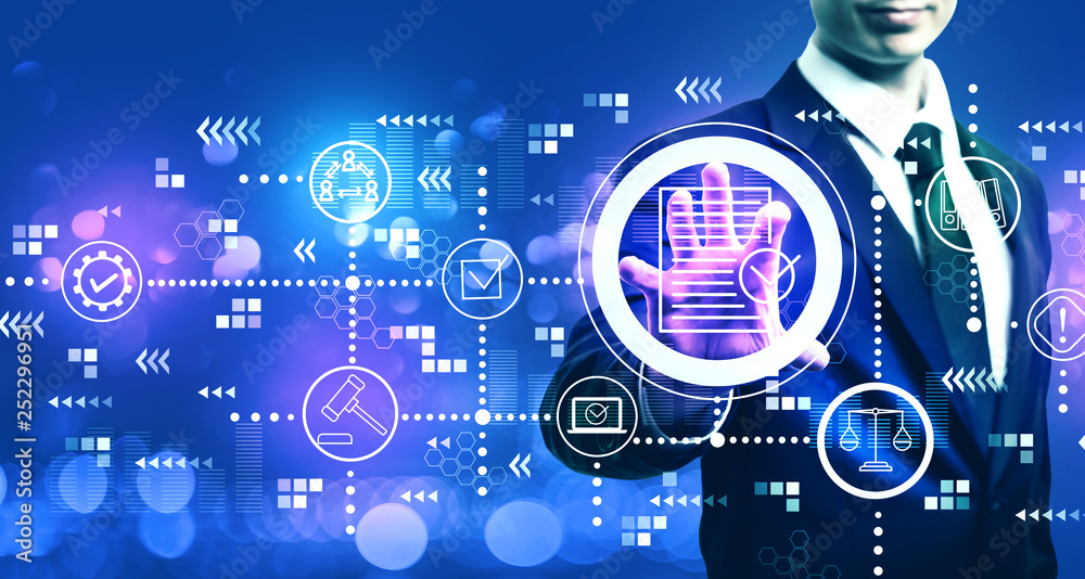 Compliance theme with businessman on blurred blue light background ...