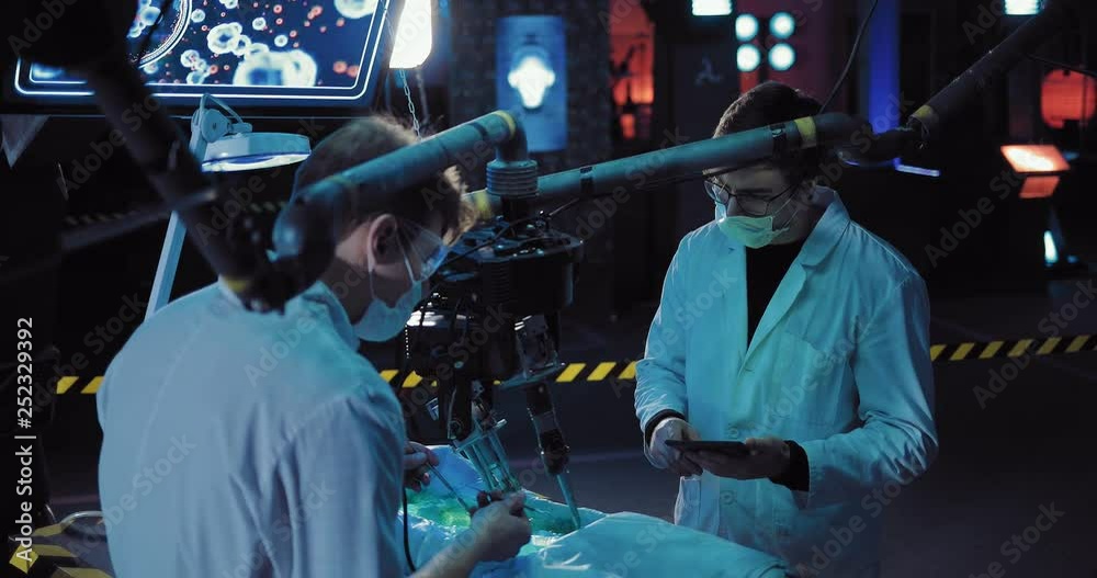 Video Stock Young scientists do an autopsy of a space alien. You can ...