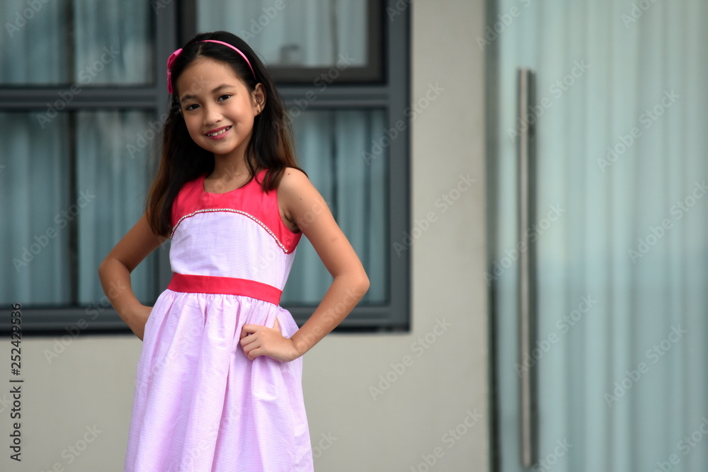 A Posing Filipina Girl Stock Photo | Adobe Stock