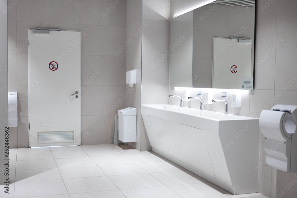 Public lavatory in shopping mall consisiting of ceramic basin, hand ...
