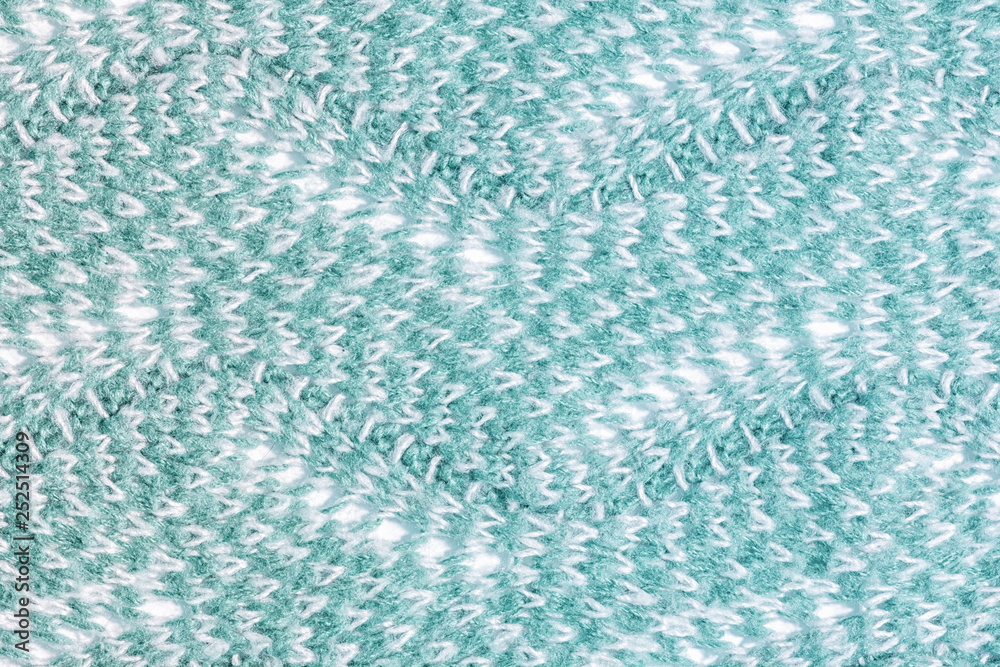 Texture knitting with an unusual pattern. Wool fabric close up ...