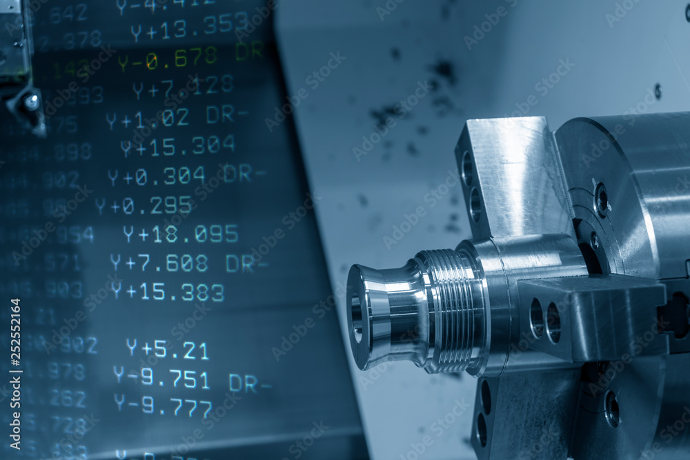 The abstract scene of CNC lathe machine and the G-code data background ...