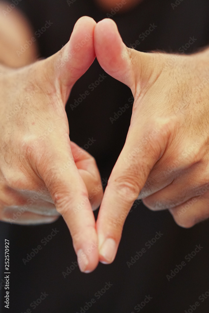 Diamond hand sign or vulva hand-gesture, sometimes also known as the ...