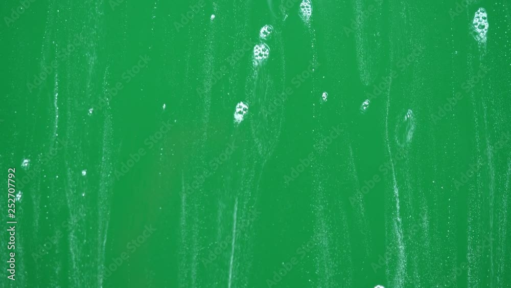 Rain drops on glass, bubbles . Green screen backround. Chroma key. 4K ...