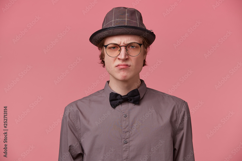 Closeup portrait skeptical young man looking disrespectful ...