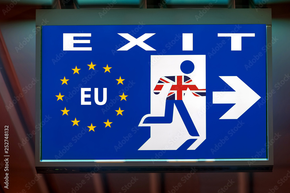 The emergency exit sign shows the direction of escape in case leave ...