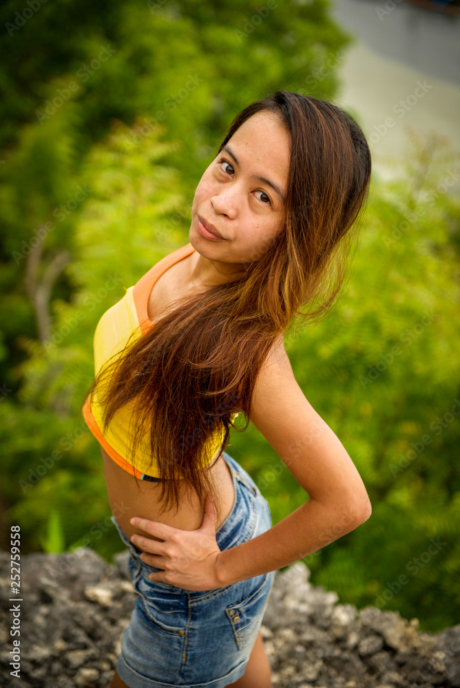 Young Filipino girl Stock Photo | Adobe Stock