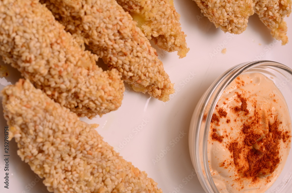 Pile of breaded crab sticks isolated Stock Photo | Adobe Stock