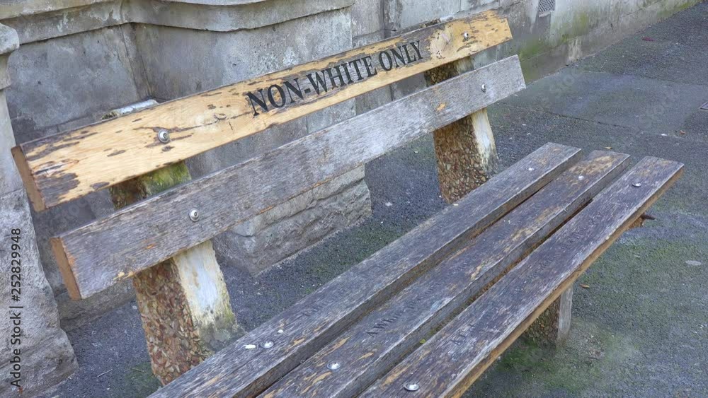 A bench sayings non-whites only along a street in Cape Town, South ...
