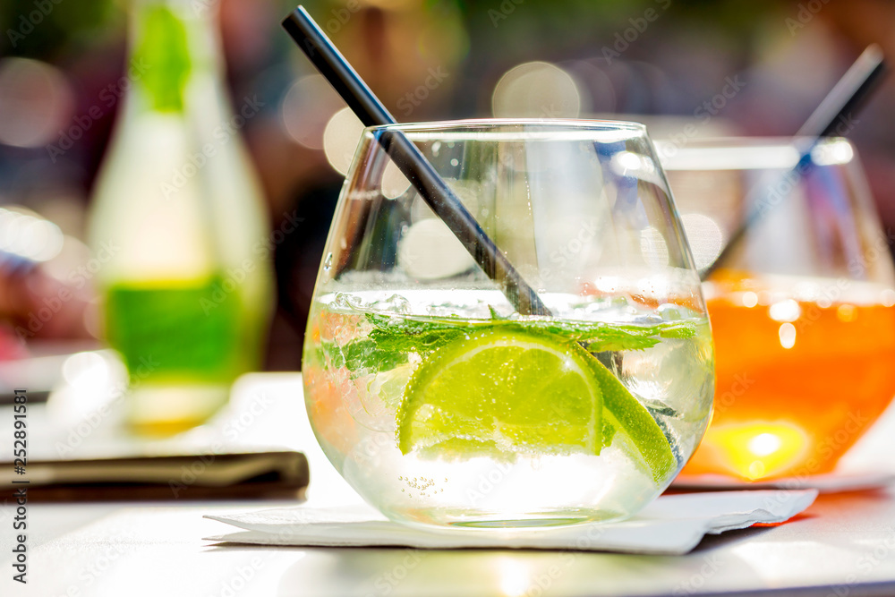 Aperol spritz and HUGO cocktail in misted glass, selective focus ...