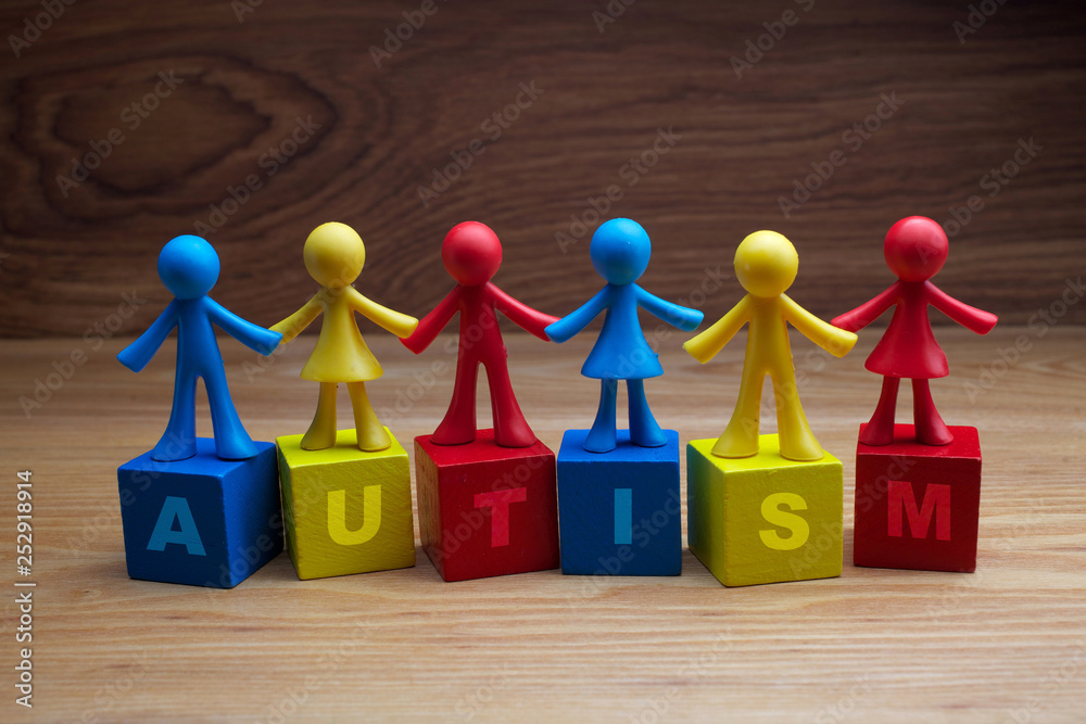 Doll children background design with autism word on cubes Stock Photo ...