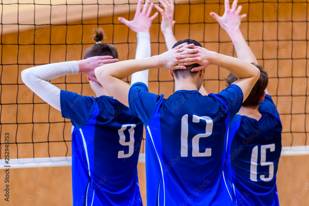 back view of a man volleyball player in action Stock Photo | Adobe Stock