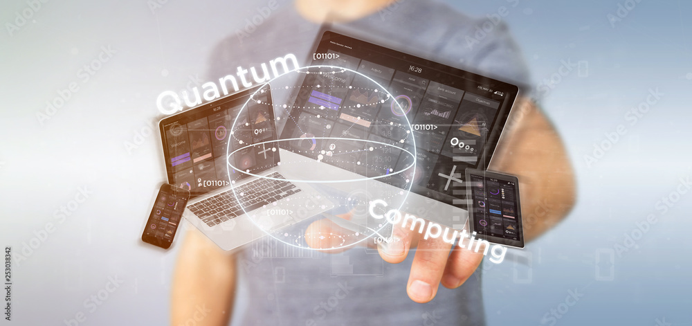 Businessman holding Quantum computing concept with qubit and devices 3d ...