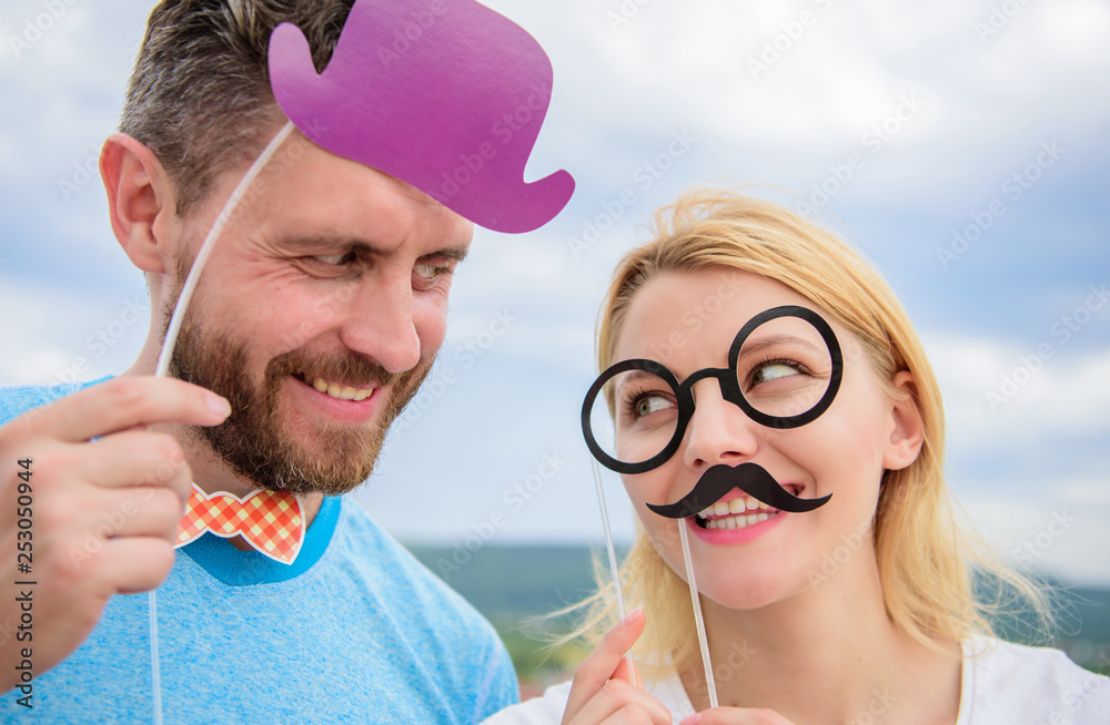 Man with beard and woman having fun party. Add some fun. Making funny ...