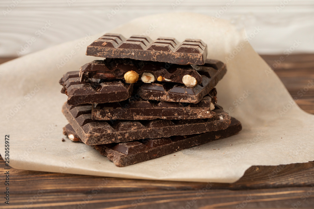 Hazelnut and almond milk and dark chocolate pieces tower. Chocolate ...