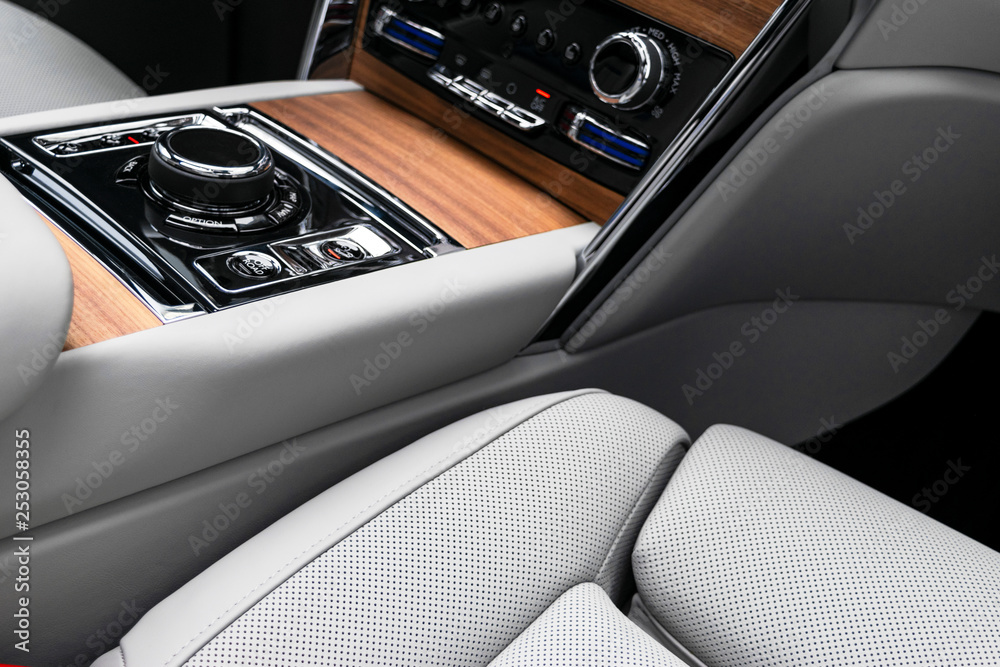 Modern luxury car white leather interior with natural wood panel. Part ...
