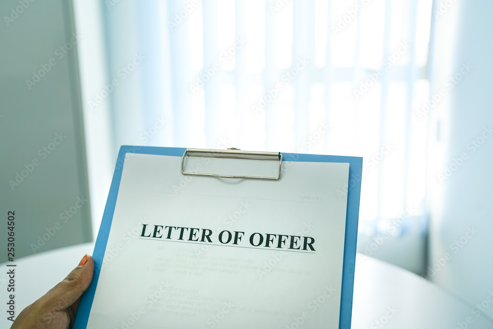 Letter of offer to be signed by potential hire Stock Photo | Adobe Stock