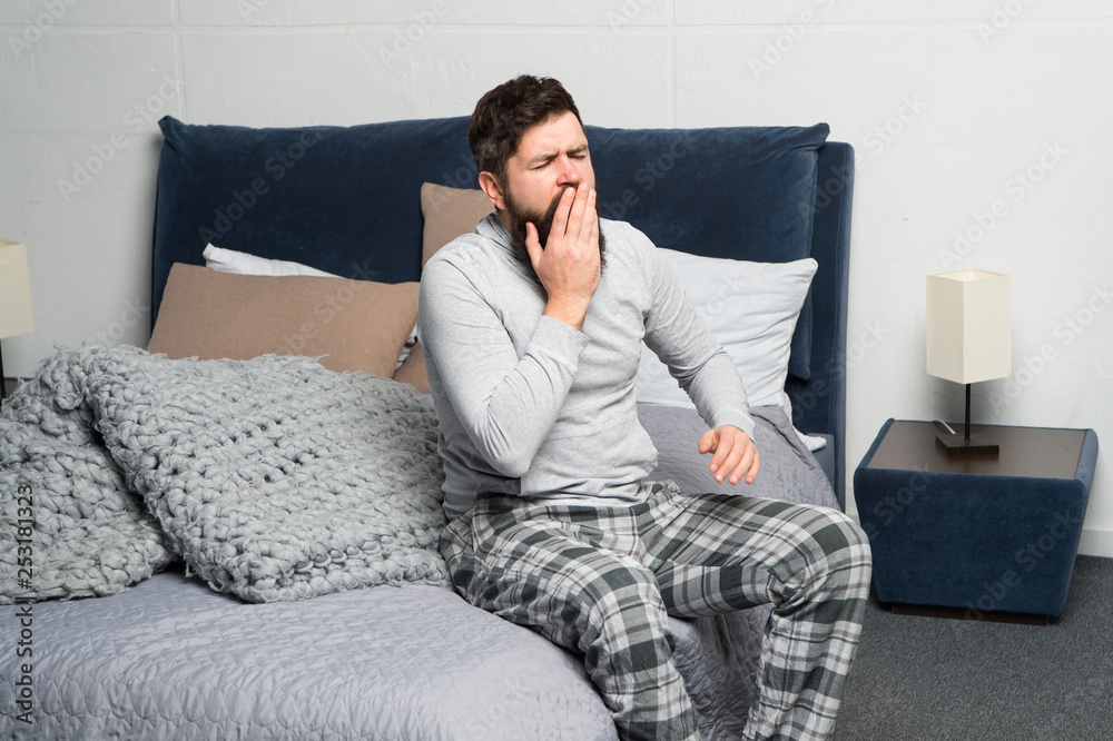 Get up early. Tips for waking up early. Man bearded hipster sleepy face ...