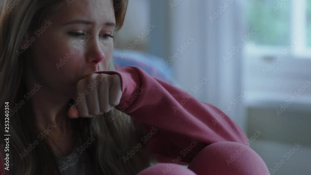sad teenage girl crying at home feeling alone depressed teen thinking ...