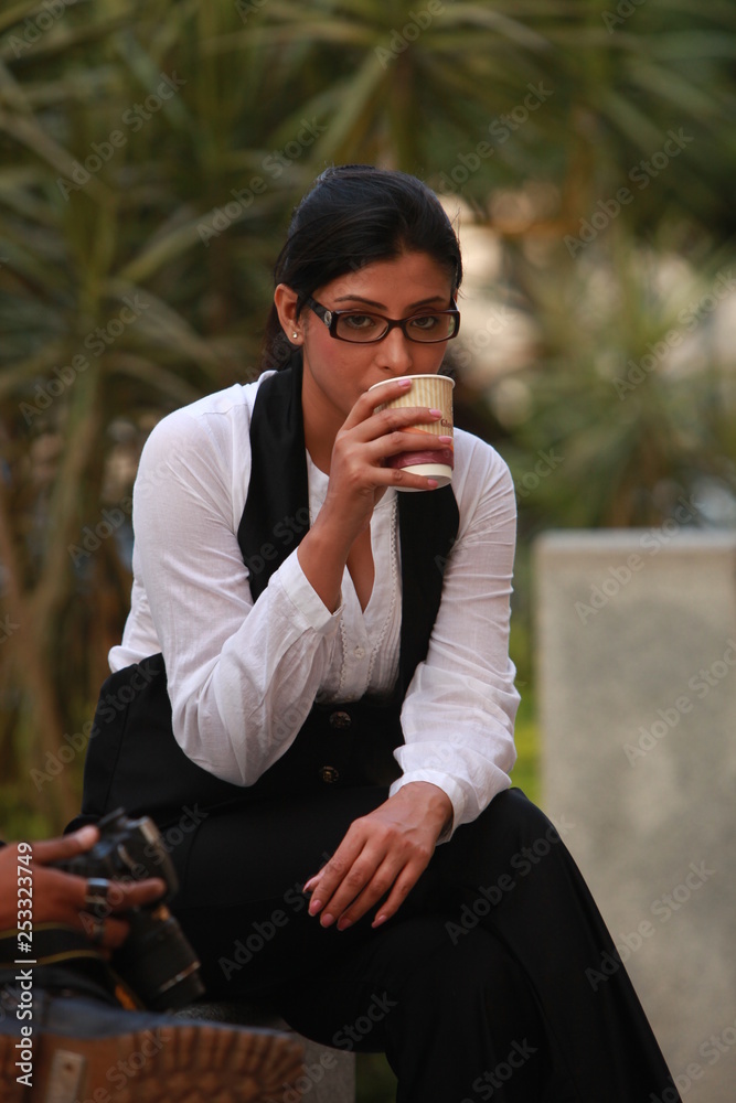 Beautiful business lady in corporate suit posing outdoor wearing ...