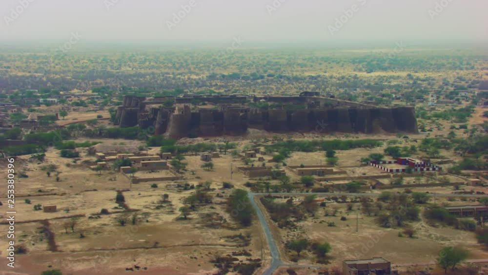 Aerial flight over the The historically-significant Derawar fort ...