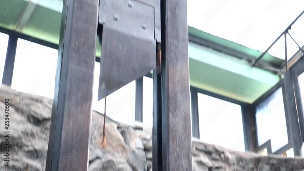 The guillotine in the stone room of the prison, ready for execution ...