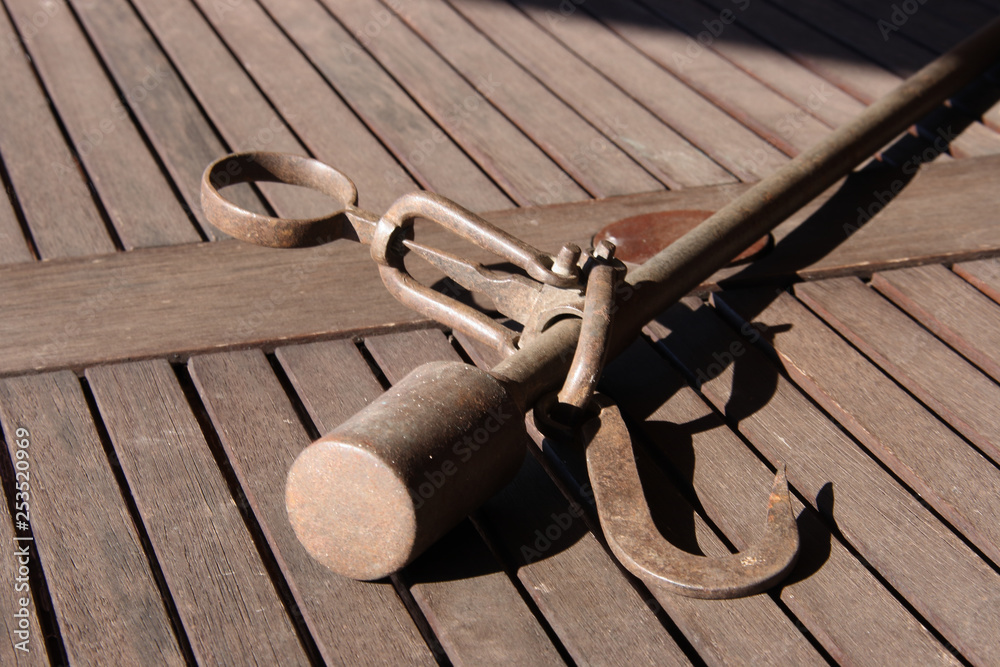 Russian bezmen, simplest lever scales on a wooden table of slats. Metal ...