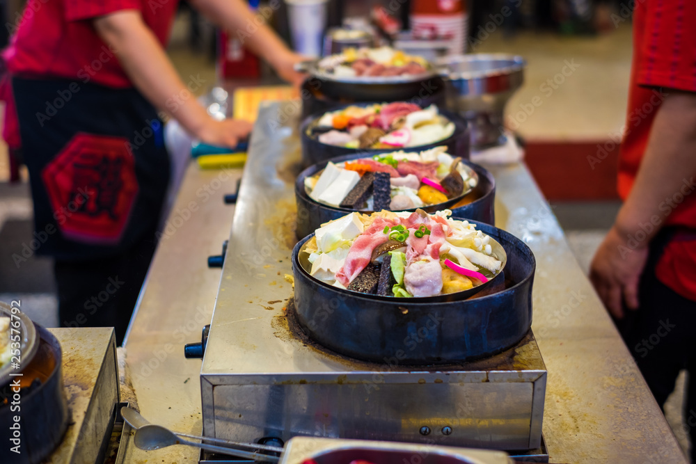 Hotpot in Taiwanese style. Hot pot is one of the most common street ...