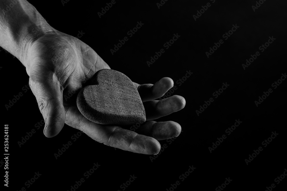 Helping hands, concept of care and support, hand giving a heart Stock ...