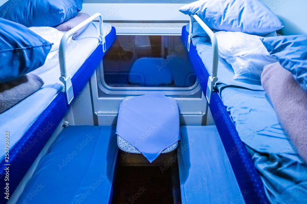 The train car with sleeping places. Wagon train compartment. Passenger ...