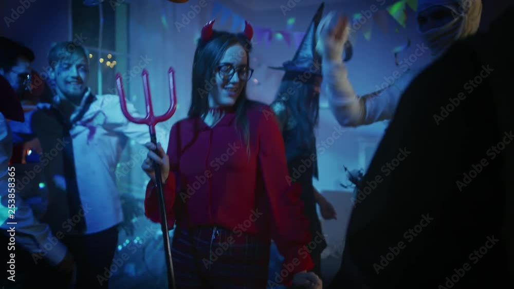 Halloween Costume Party: Group of Monsters Dancing in Decorated Room ...
